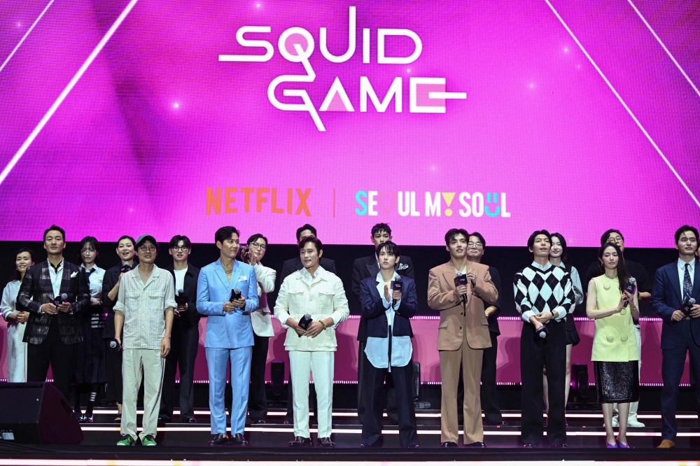 Masked marchers and giant dolls: ‘Squid Game’ finale sparks fan parade ...
