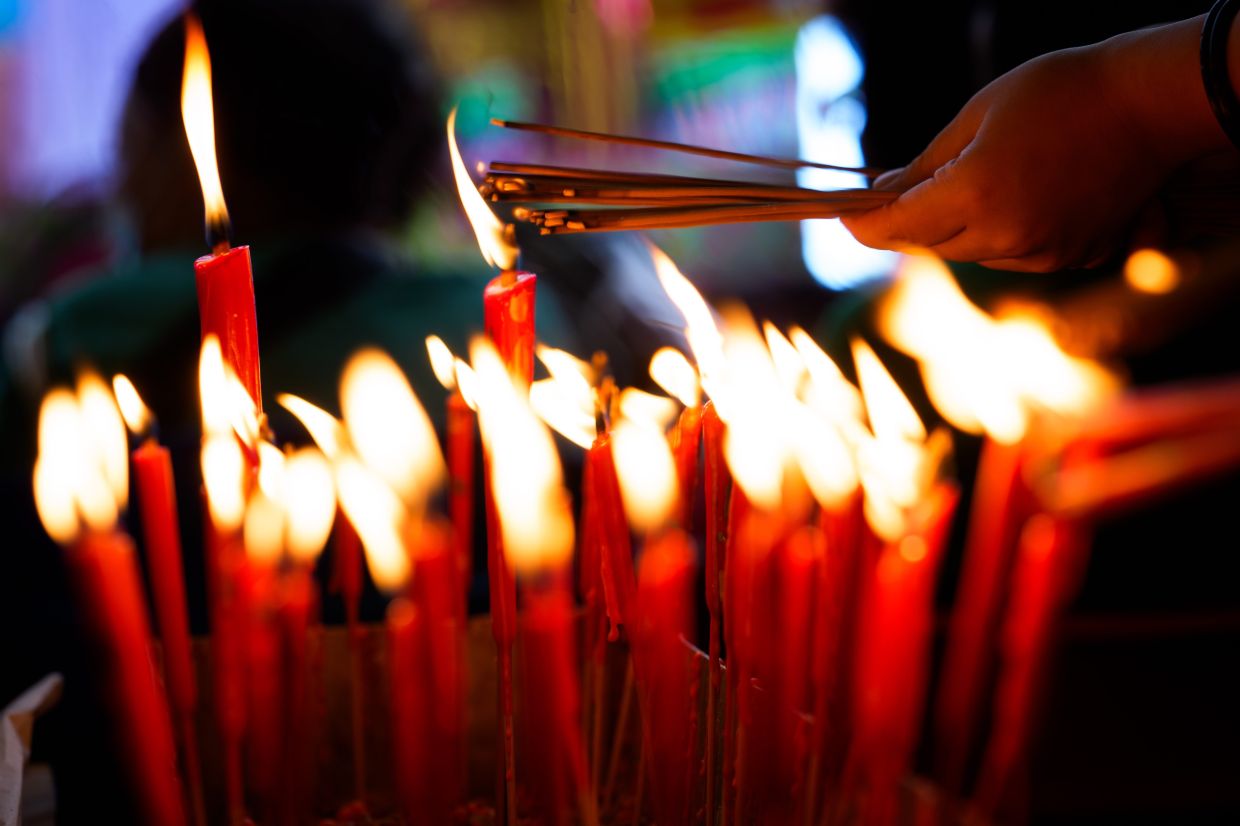 The living care for ancestors, wandering spirits at Hungry Ghost ...